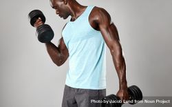 Muscular male model lifting heavy dumbbells - Premium Photo (5oQ7Qb ...