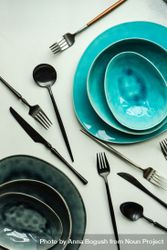 Top View Of Full Teal Table Setting Surrounded With Silverware With On ...