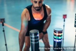 Male athlete using a visual stimulus system to improve reaction time at ...