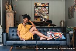 Black Woman Sitting On Couch - Free Photo (5Q2994) - Noun Project