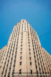 Look Up At Tall Cream Building Against A Blue Sky - Free Photo (0WYPW4 ...