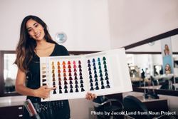 Professional Colorist Pointing At Hair Color Sample Chart - Free Photo ...