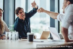 Excited Professional Reaching Across Table To High Five Employee - Free ...