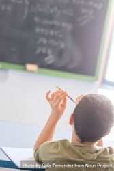 Back Of Male Student Sitting In Class Looking At Board - Free Photo ...