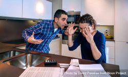 Couple arguing in kitchen with bills on counter - Free Photo (4ZyPn5 ...