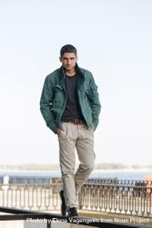 Full Body Portrait Of Male In Green Jacket And Slacks Walking Atop ...