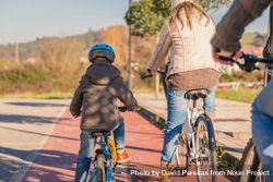 Back of mother and son on family bike ride together - Free Photo ...