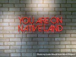 You Are On Native Land neon sign at Owamni by The Sioux Chef in ...