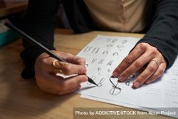 Crop goldsmith drawing with pencil - Free Photo (0v3lYB) - Noun Project